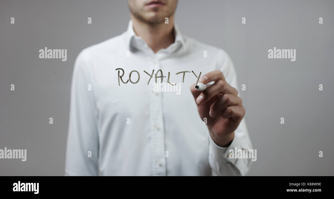 Royalty , Man Writing on Glass Stock Photo - Alamy