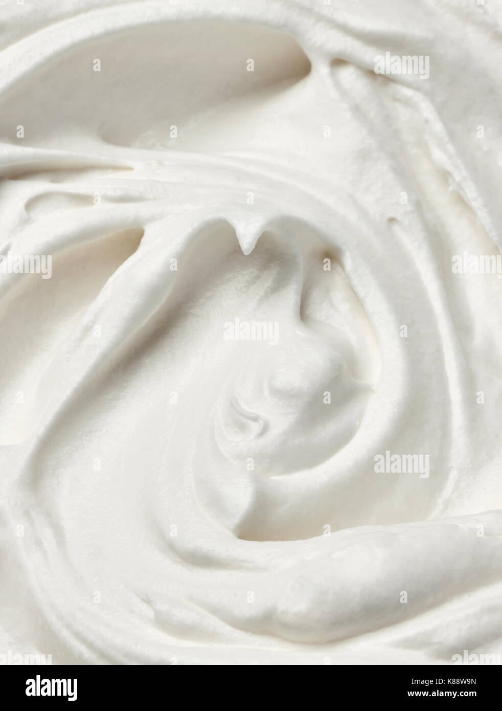 close up of a whipped cream on white background isolated Stock Photo ...