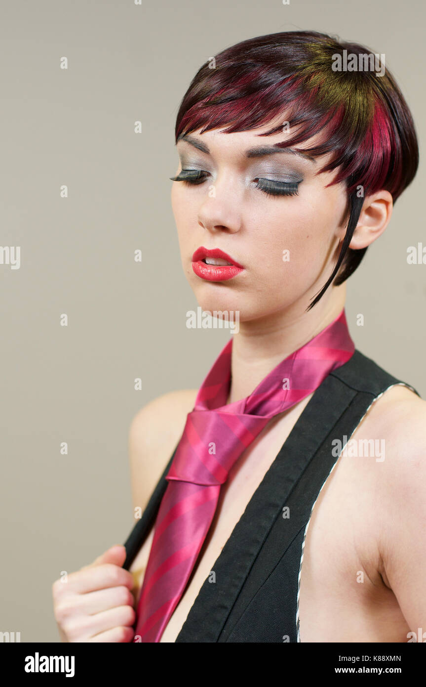 Beautiful girl with a short hairstyle - studio Stock Photo - Alamy