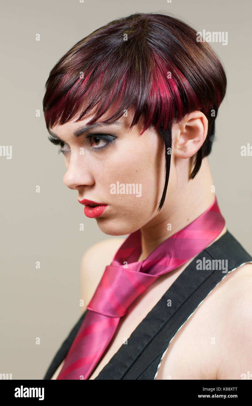 Beautiful girl with a short hairstyle - studio Stock Photo - Alamy