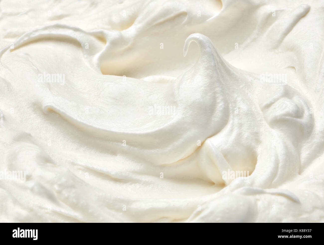 close up of a whipped cream on white background isolated Stock Photo ...