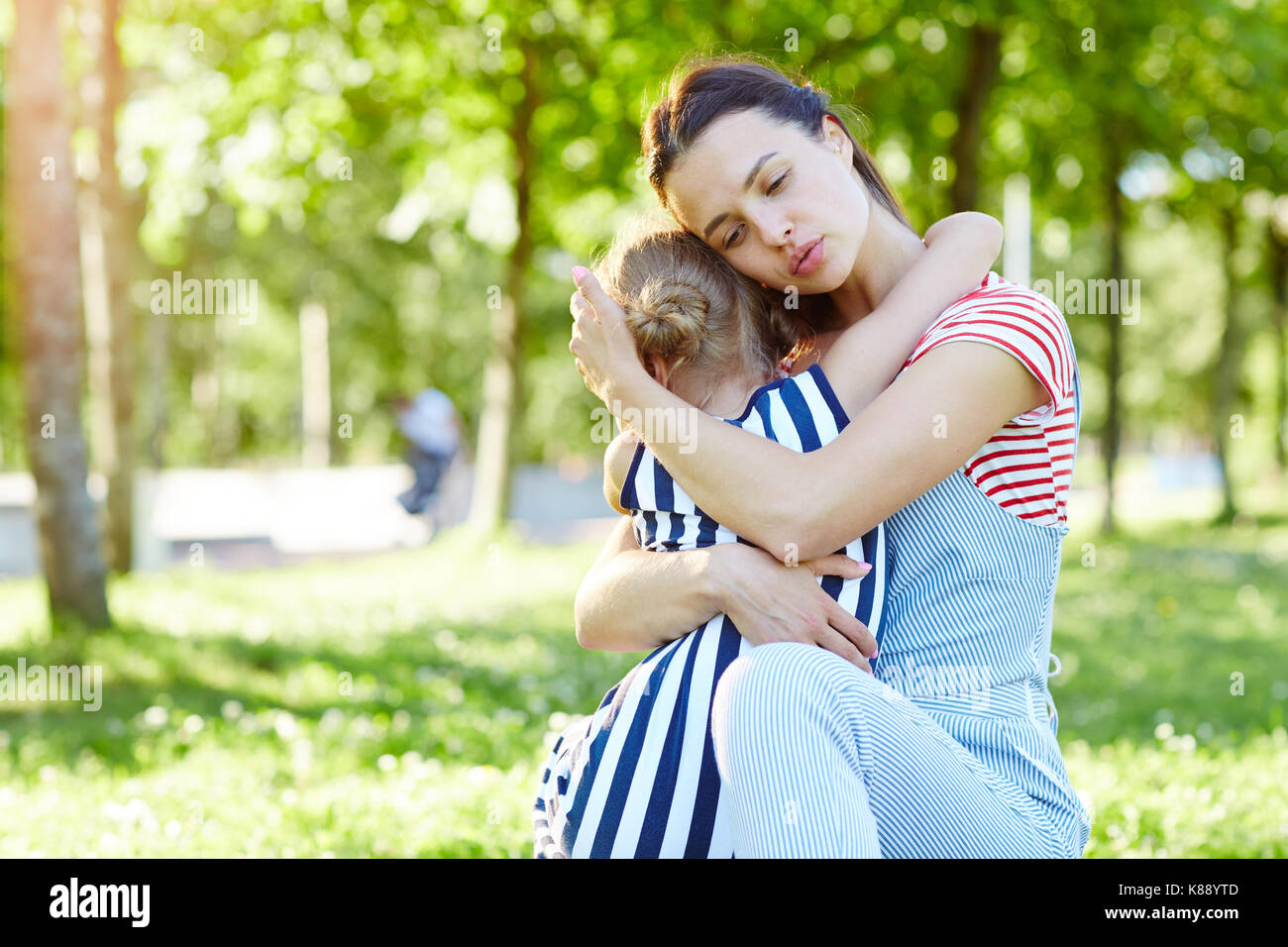 Mother comforting upset daughter hi-res stock photography and images - Alamy