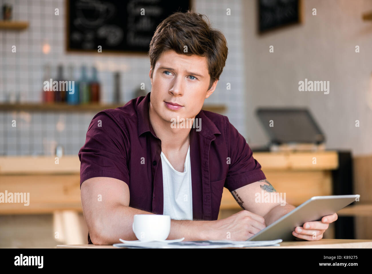 man using digital tablet Stock Photo - Alamy