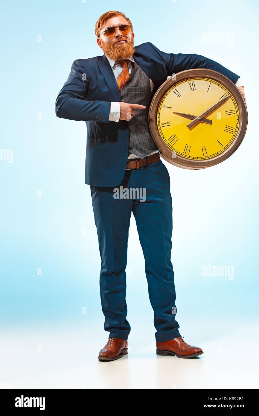 The barded man in a suit holding cane Stock Photo - Alamy