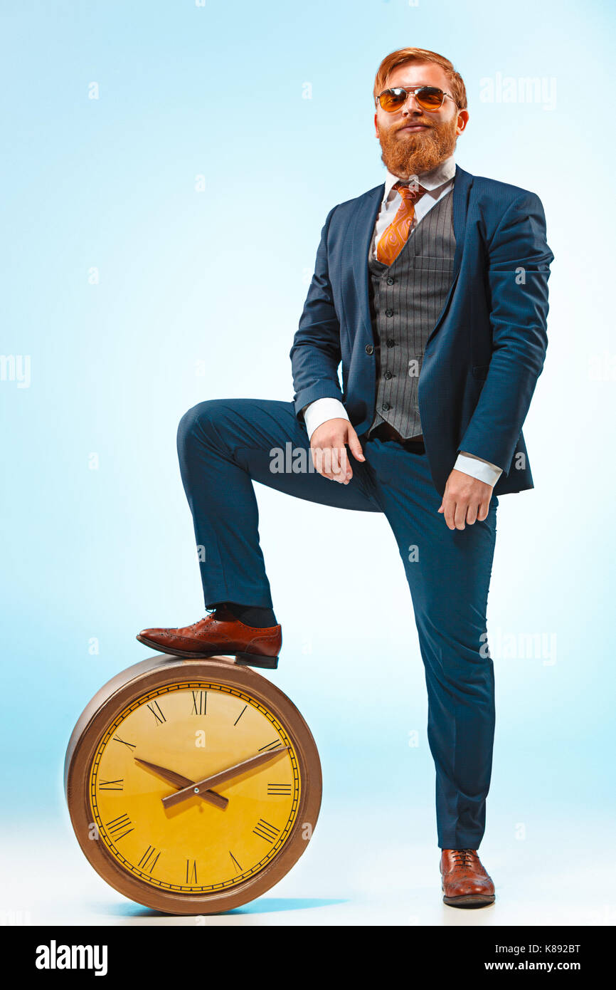 The barded man in a suit holding cane Stock Photo - Alamy
