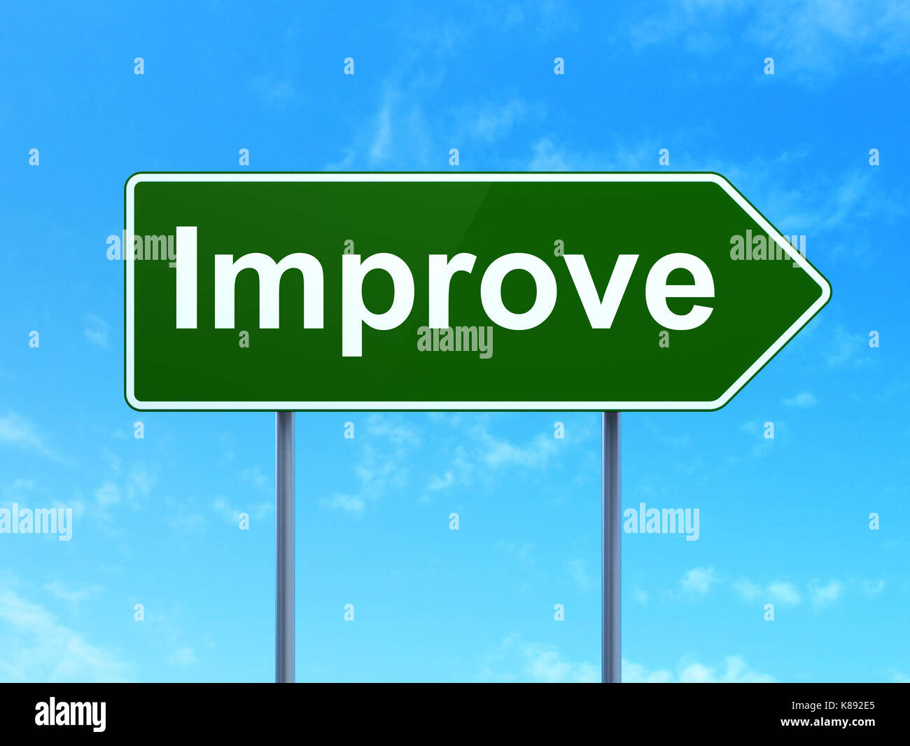 Business concept: Improve on road sign background Stock Photo - Alamy