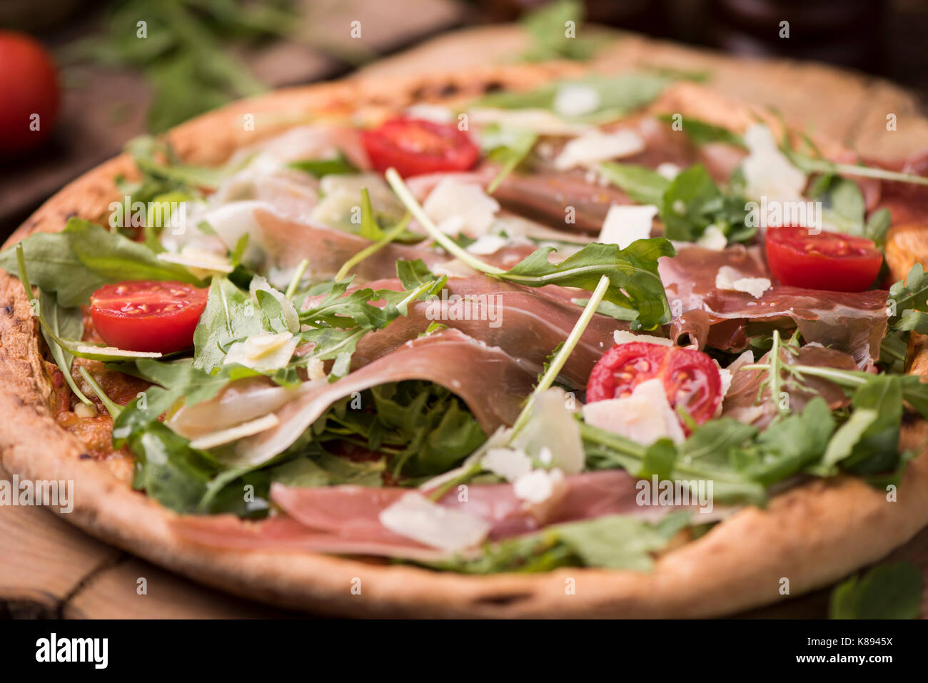 Italian prosciutto and rucola pizza Stock Photo - Alamy