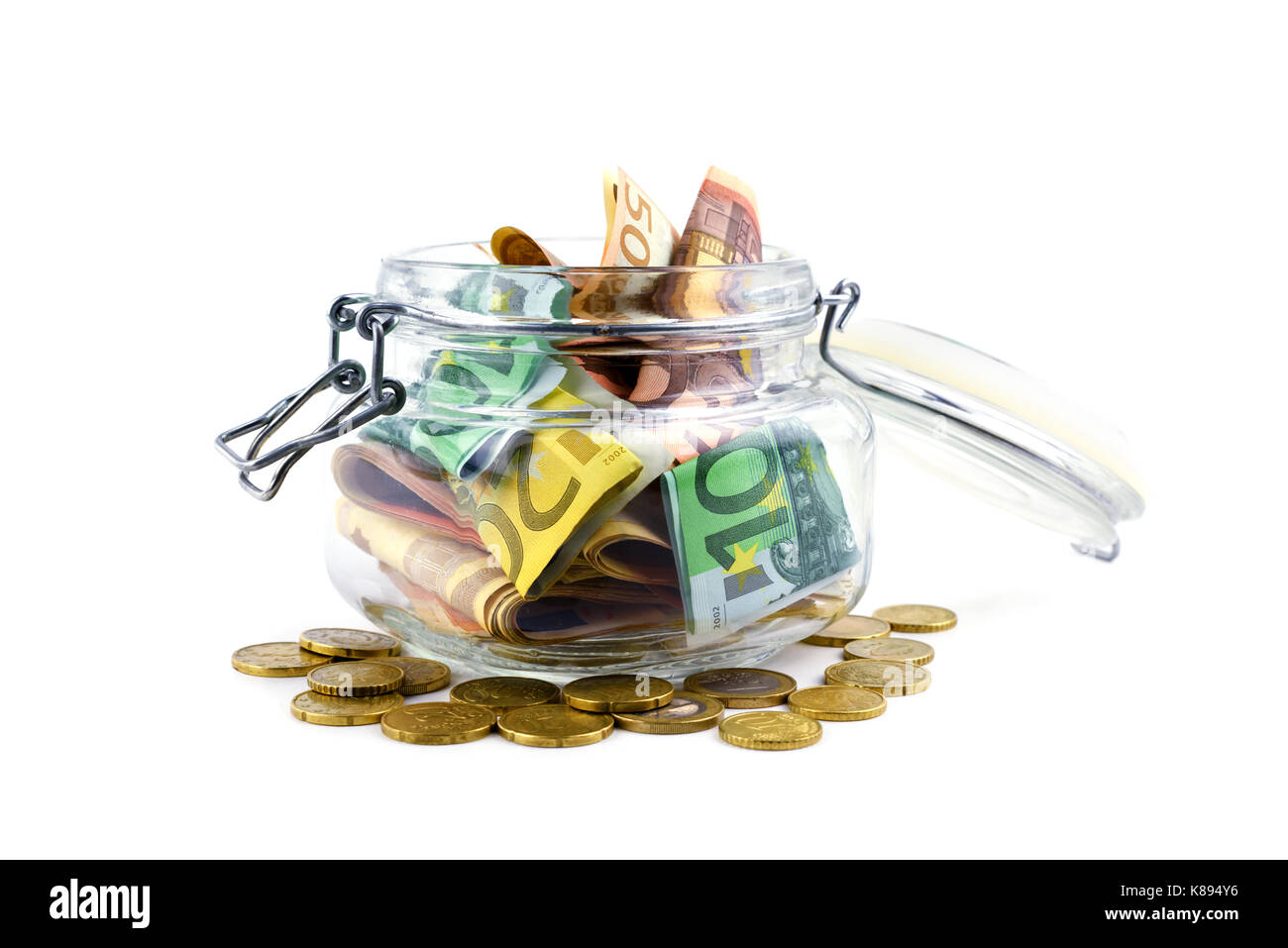 Cash in money jar hi-res stock photography and images - Alamy