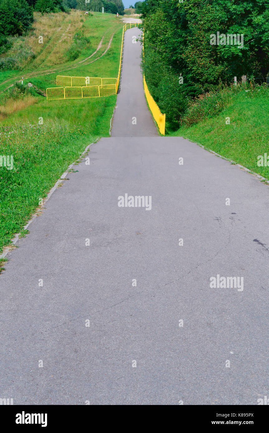 a long road through field and forest, landscape, top view, rise high ...