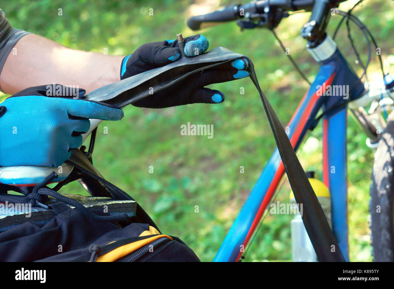 bike broke, wheel puncture, hole in the camera to fix on the trip Stock ...