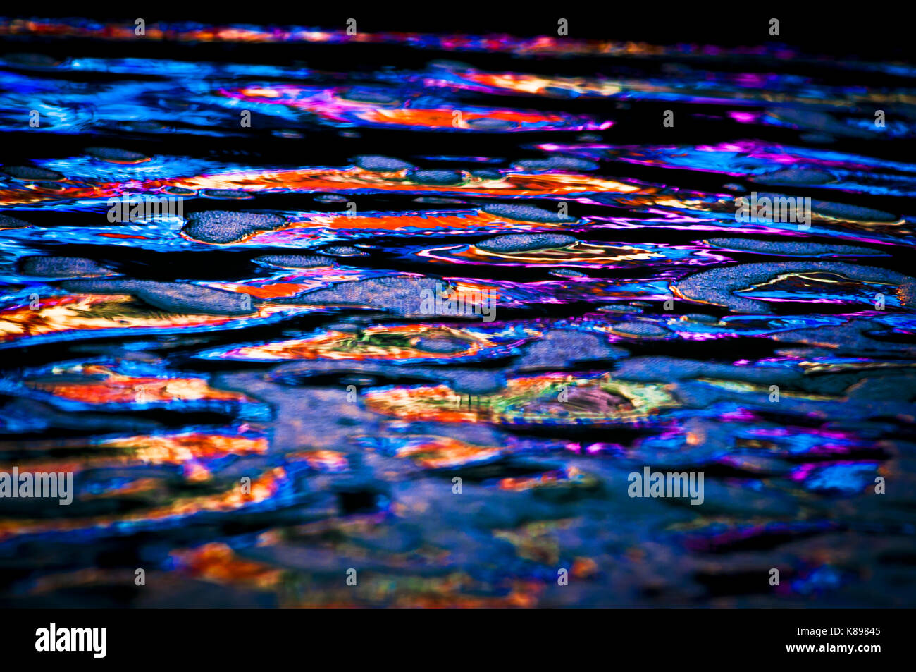 Color Reflection Over Moving Water Stock Photo - Alamy