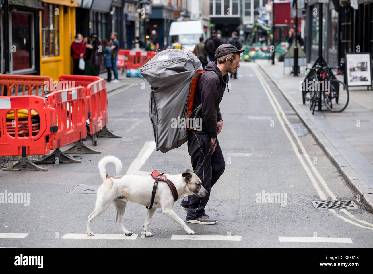 Homeless man with dog hi-res stock photography and images - Alamy