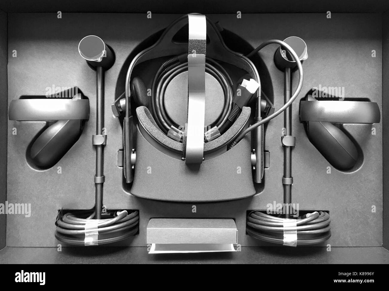 New virtual reality headset and controllers in a box Stock Photo - Alamy