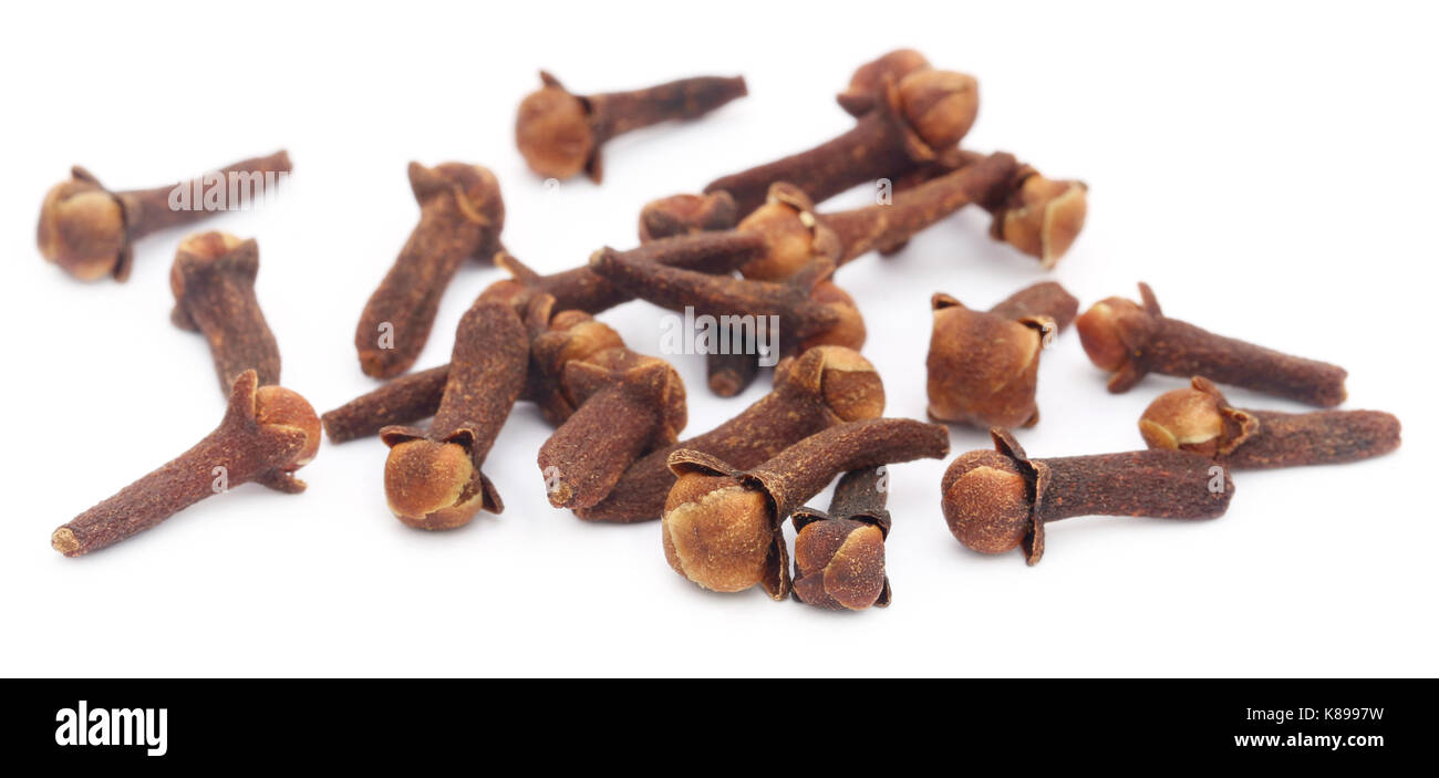 Fresh cloves over white background Stock Photo - Alamy