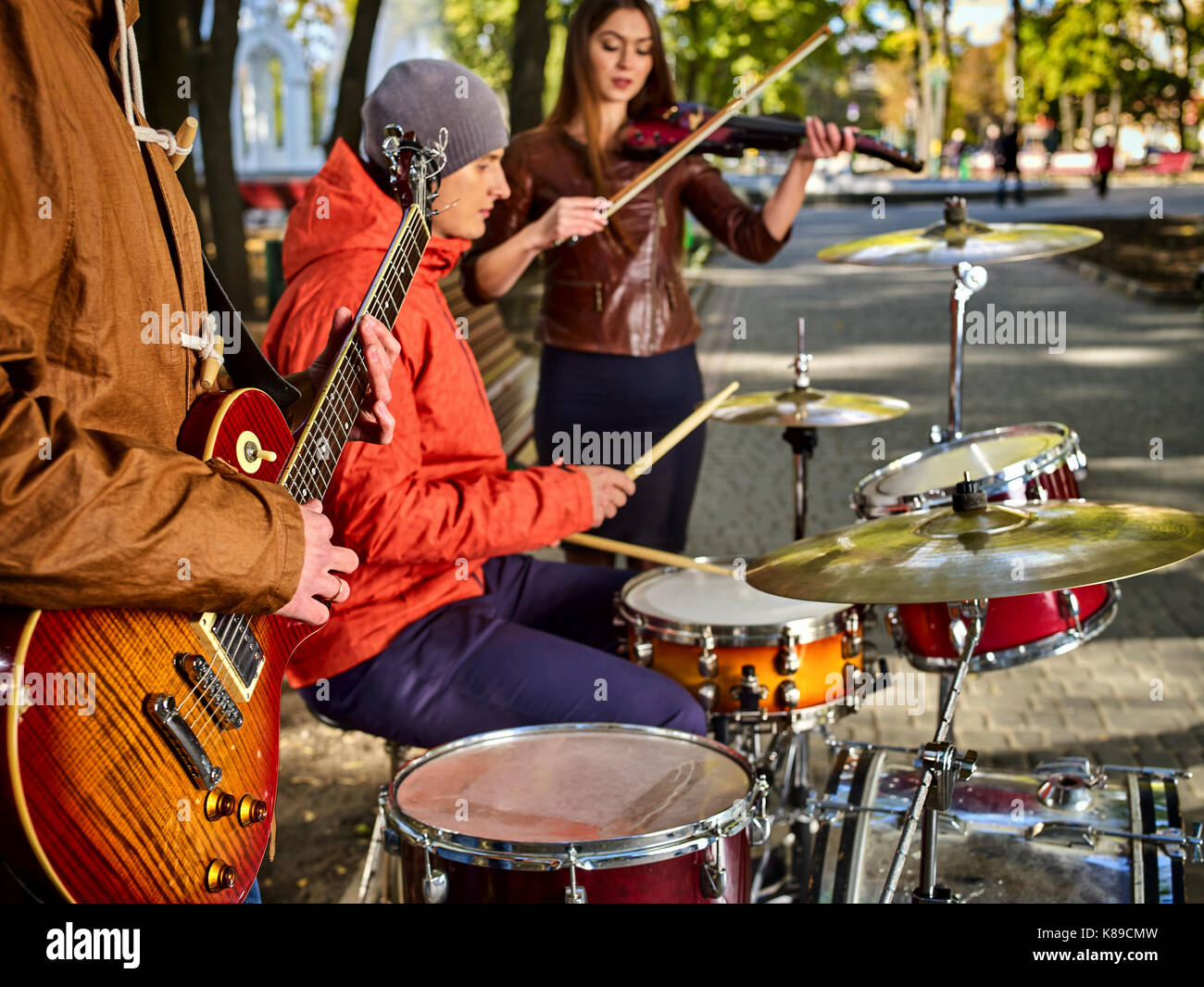 Festival music band. Friends playing on percussion instruments city ...