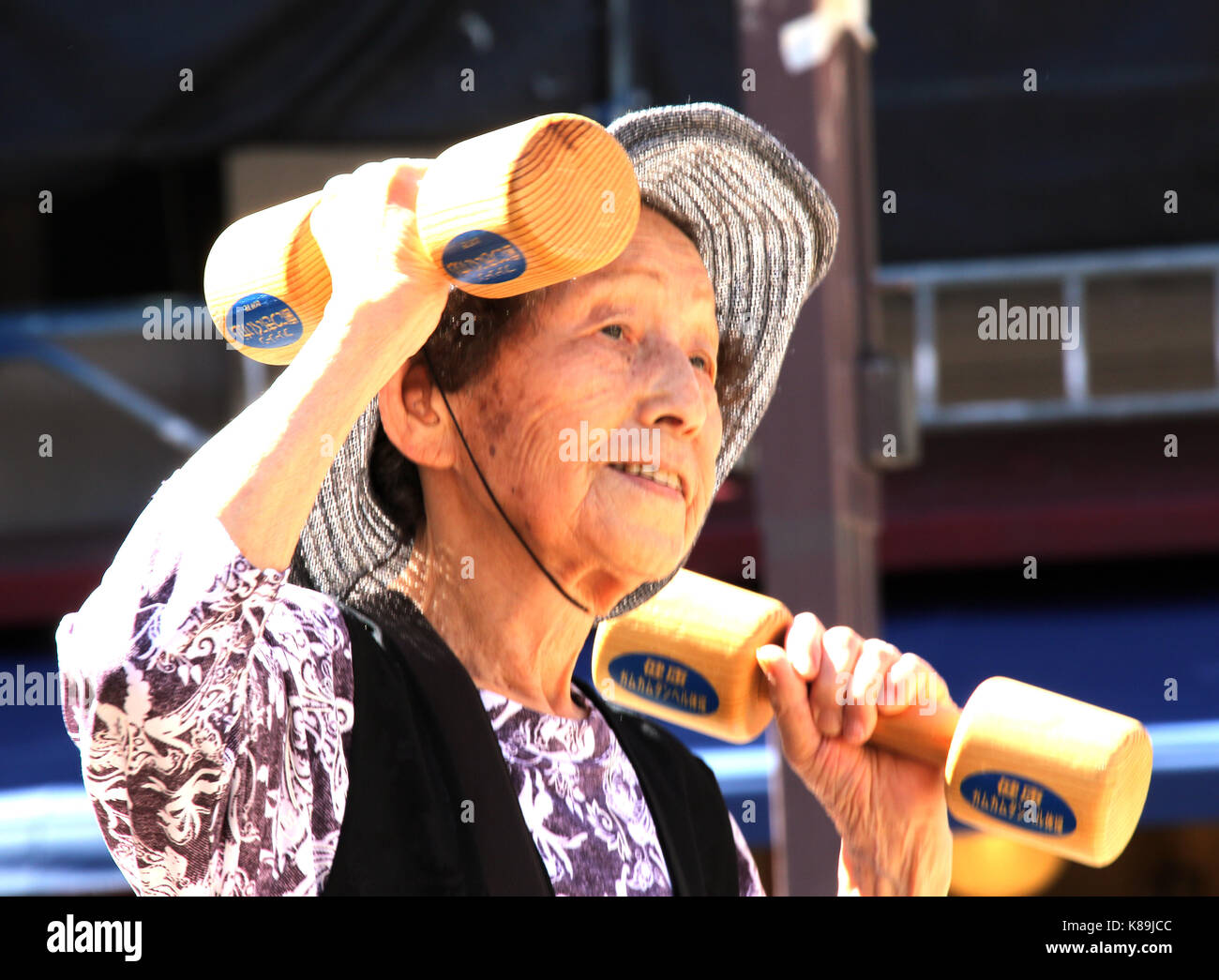 Tokyo, Japan. 18th Sep, 2017. Elderly people work out with wooden ...