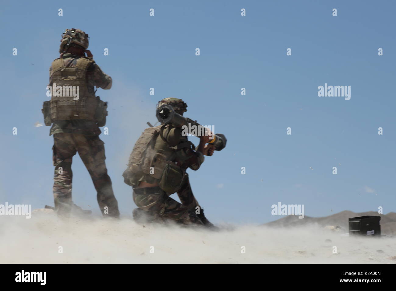 Legionnaires from the 2REP (Second Foreign Paratroop Regiment) fire an ...