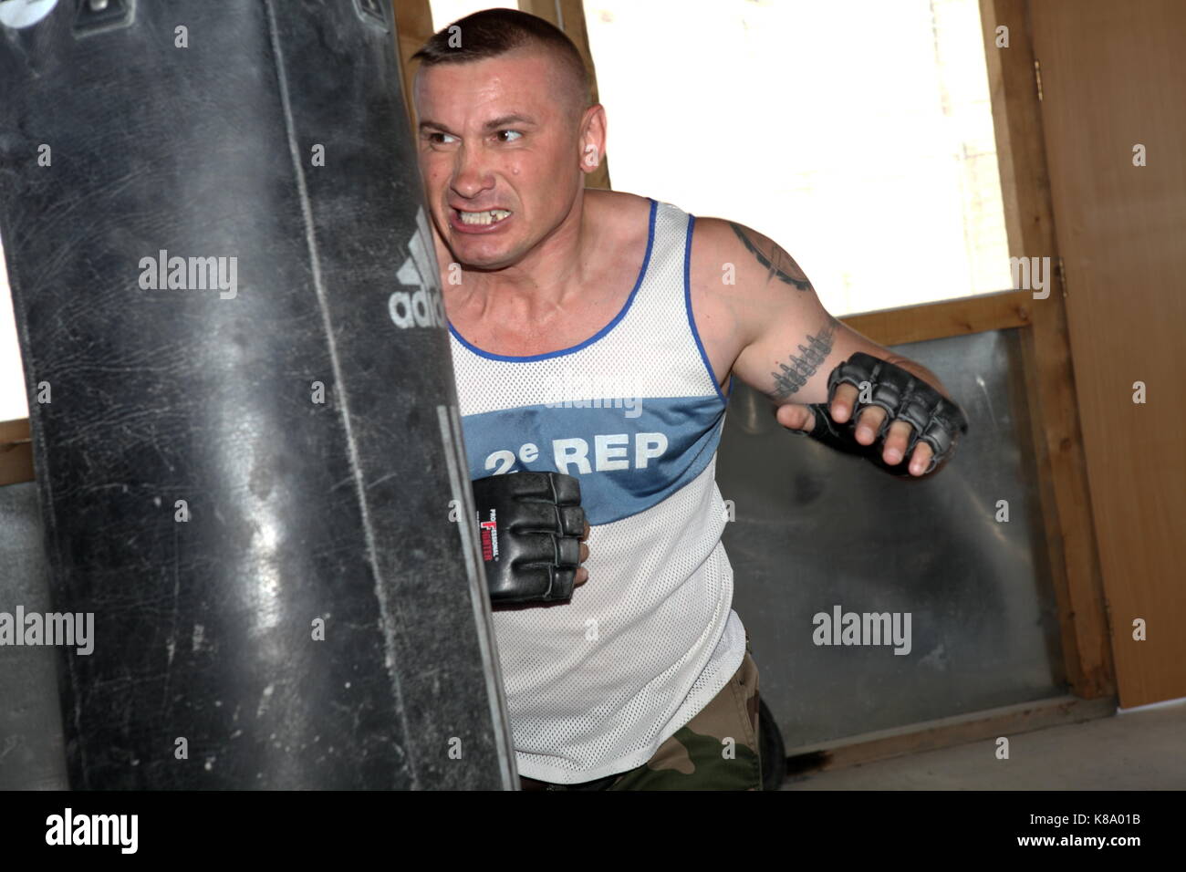 A legionnaire from the 2REP (Second Foreign Paratroop Regiment) hits ...