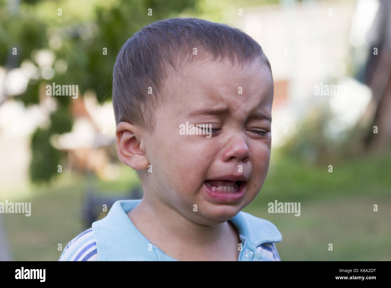 Portrait boy crying on street hi-res stock photography and images - Alamy