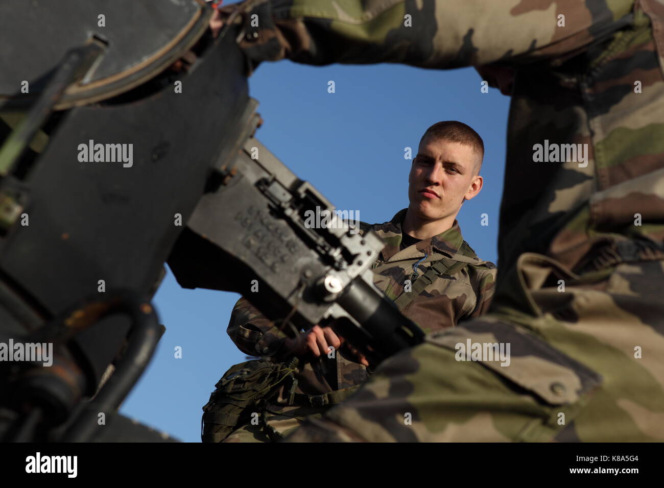 A legionnaire from the 2REP (2nd Foreign Paratroop Regiment) looks on ...