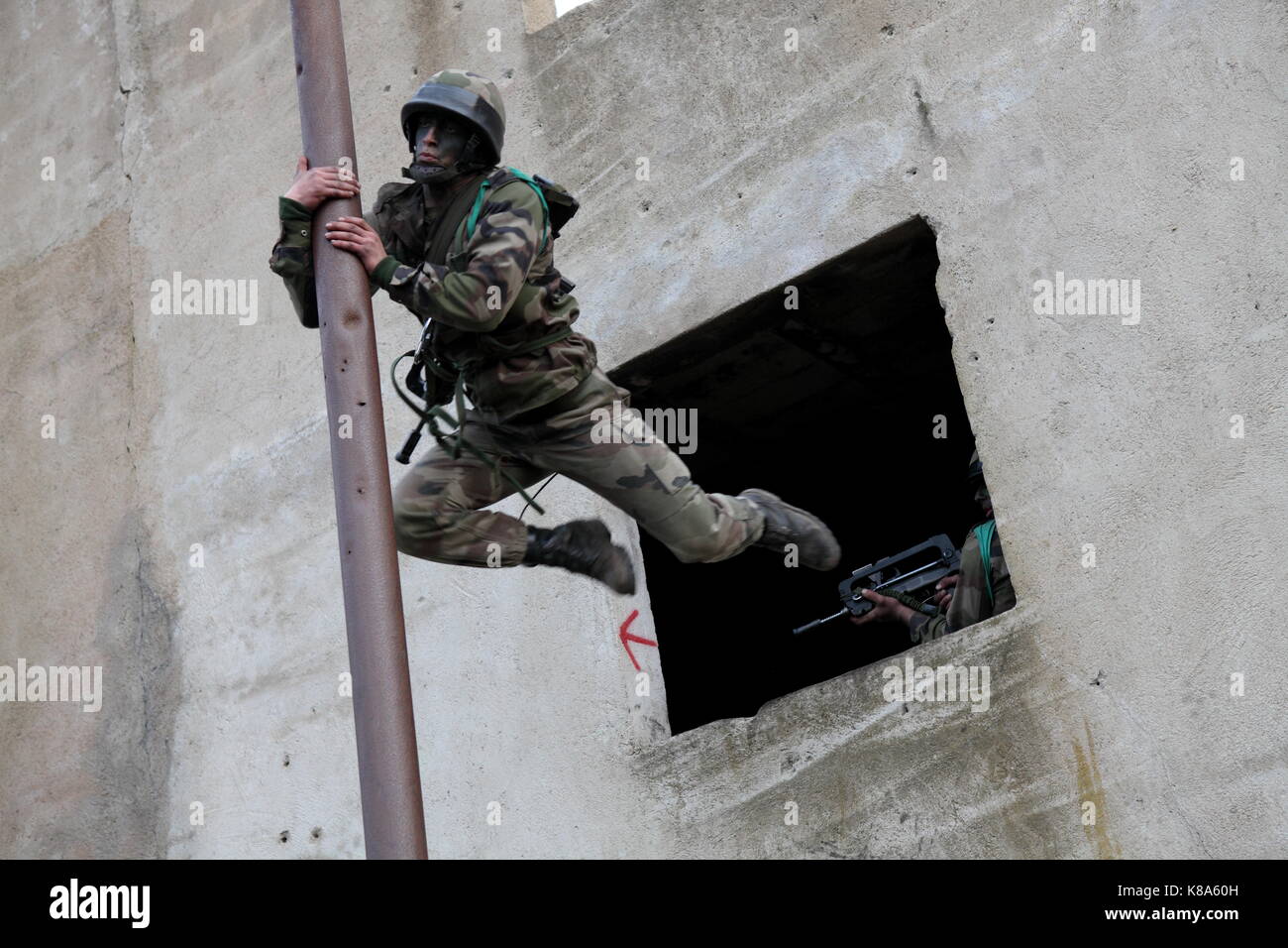 A legionnaire from the 2REP (2nd Foreign Paratroop Regiment) jumps from ...