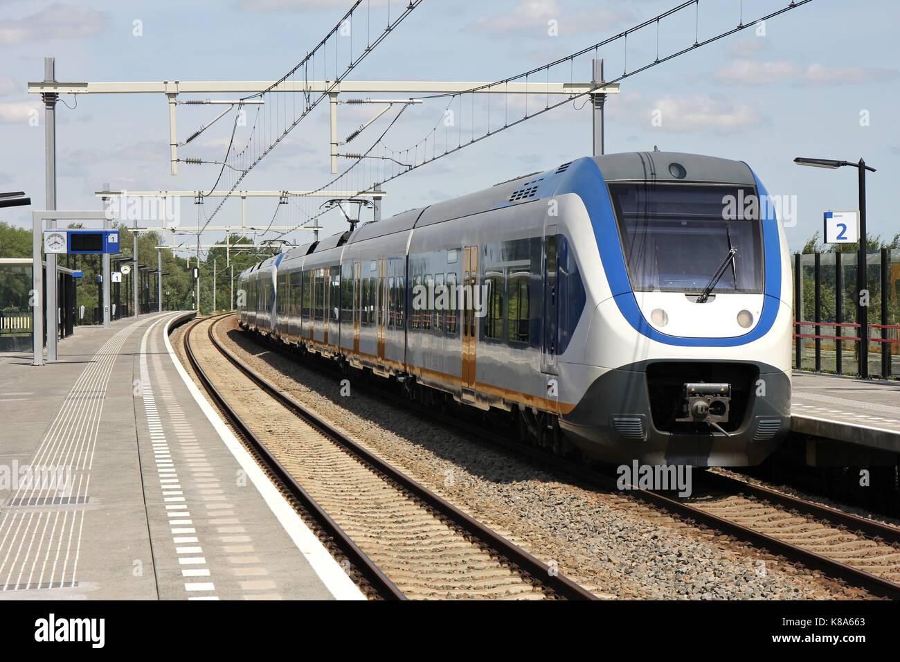 platform of a modern railway station Stock Photo - Alamy