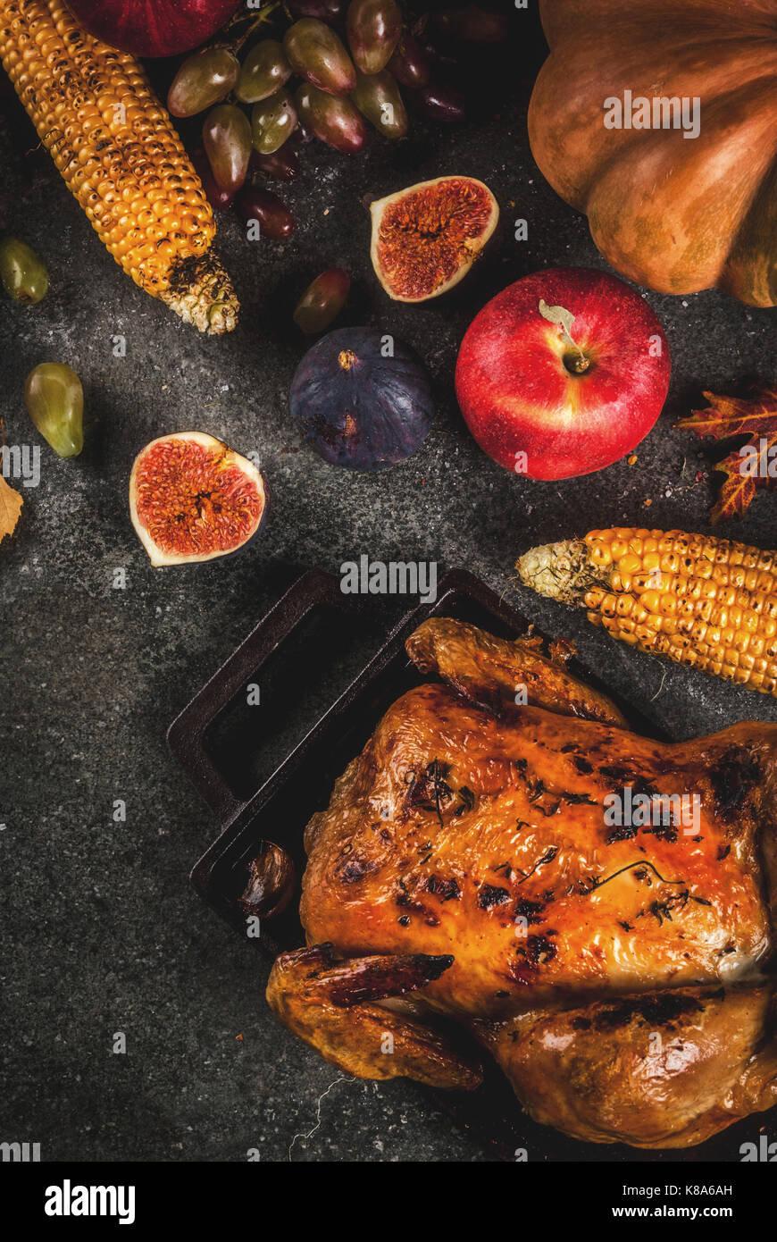 Thanksgiving Day food. Roasted whole chicken or turkey with autumn ...
