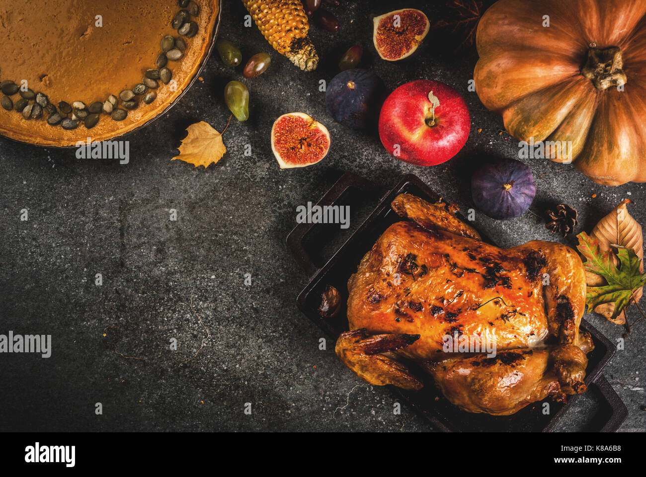 Thanksgiving Day food. Roasted whole chicken or turkey with autumn ...