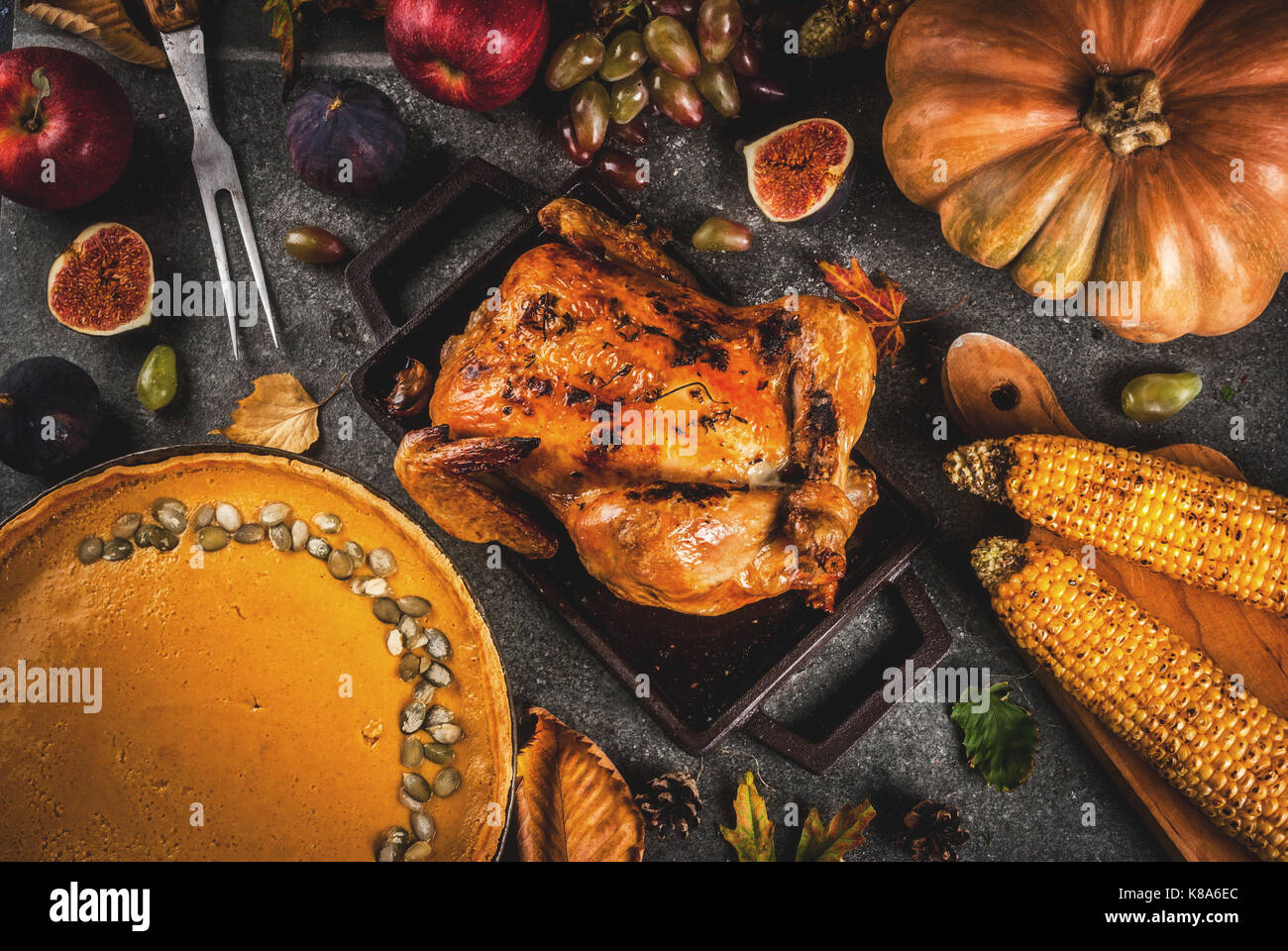 Thanksgiving Day food. Roasted whole chicken or turkey with autumn ...