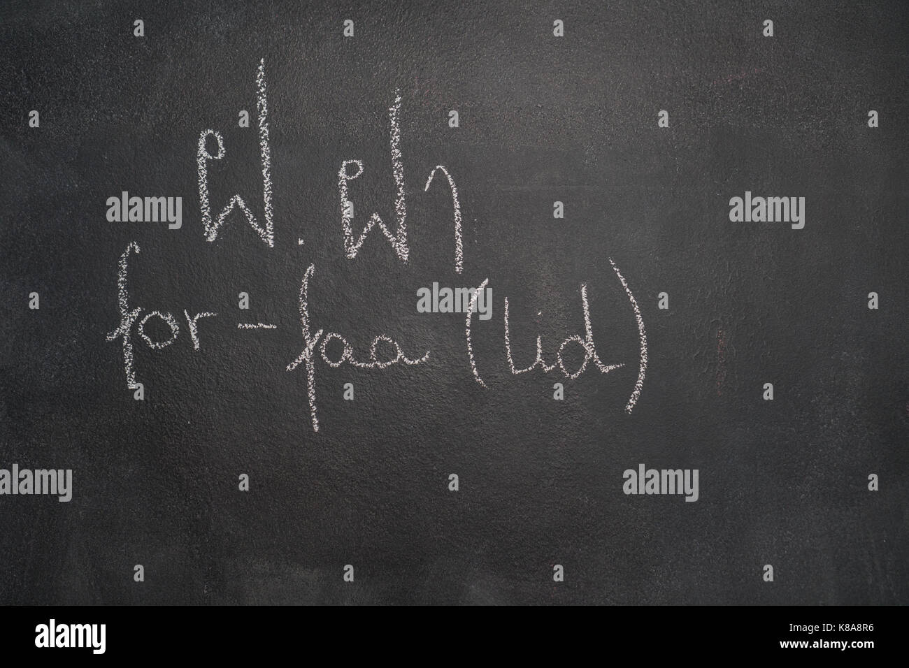 Thai letter written with white chalk on blackboard Stock Photo - Alamy