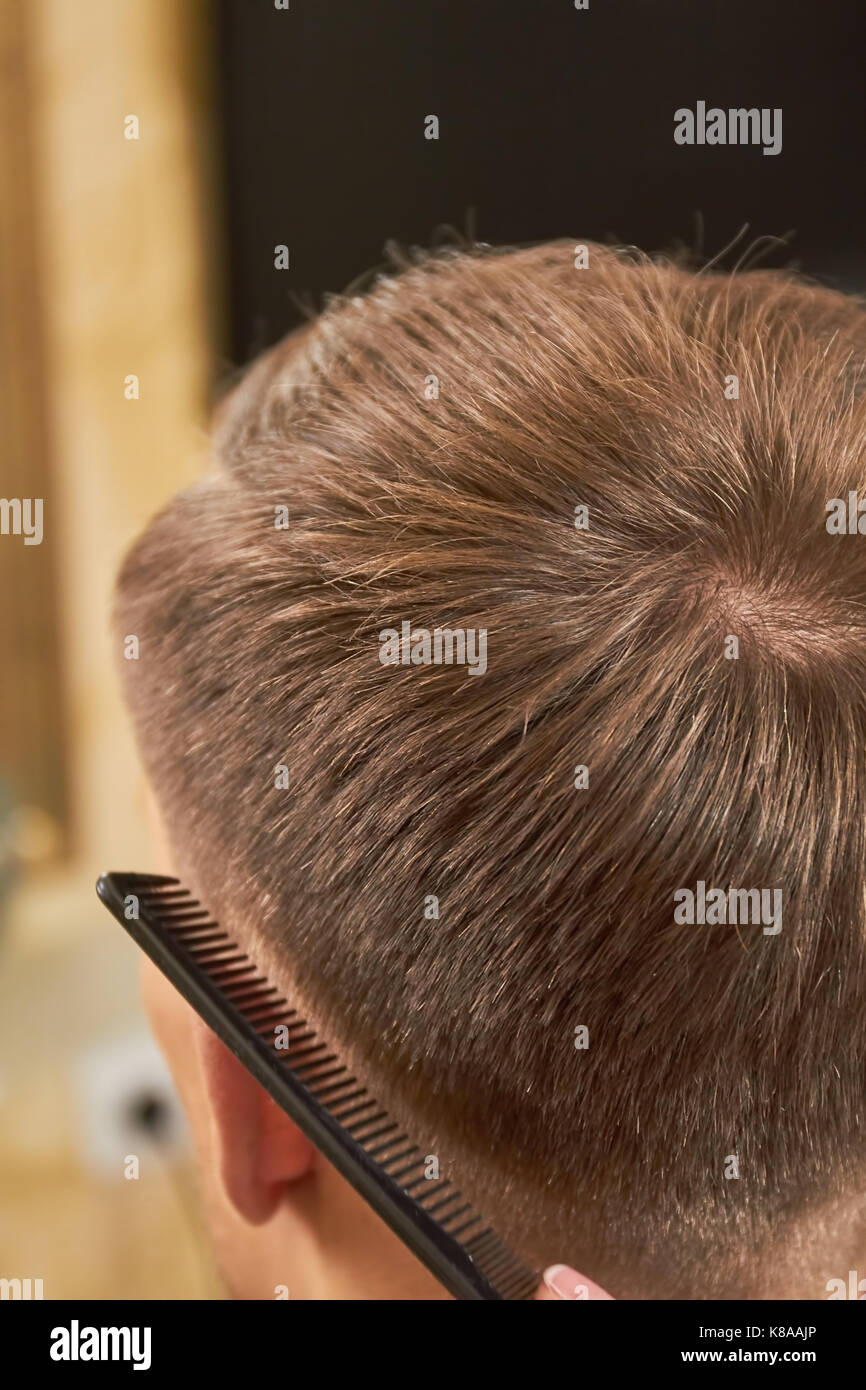 Male hair and comb Stock Photo - Alamy