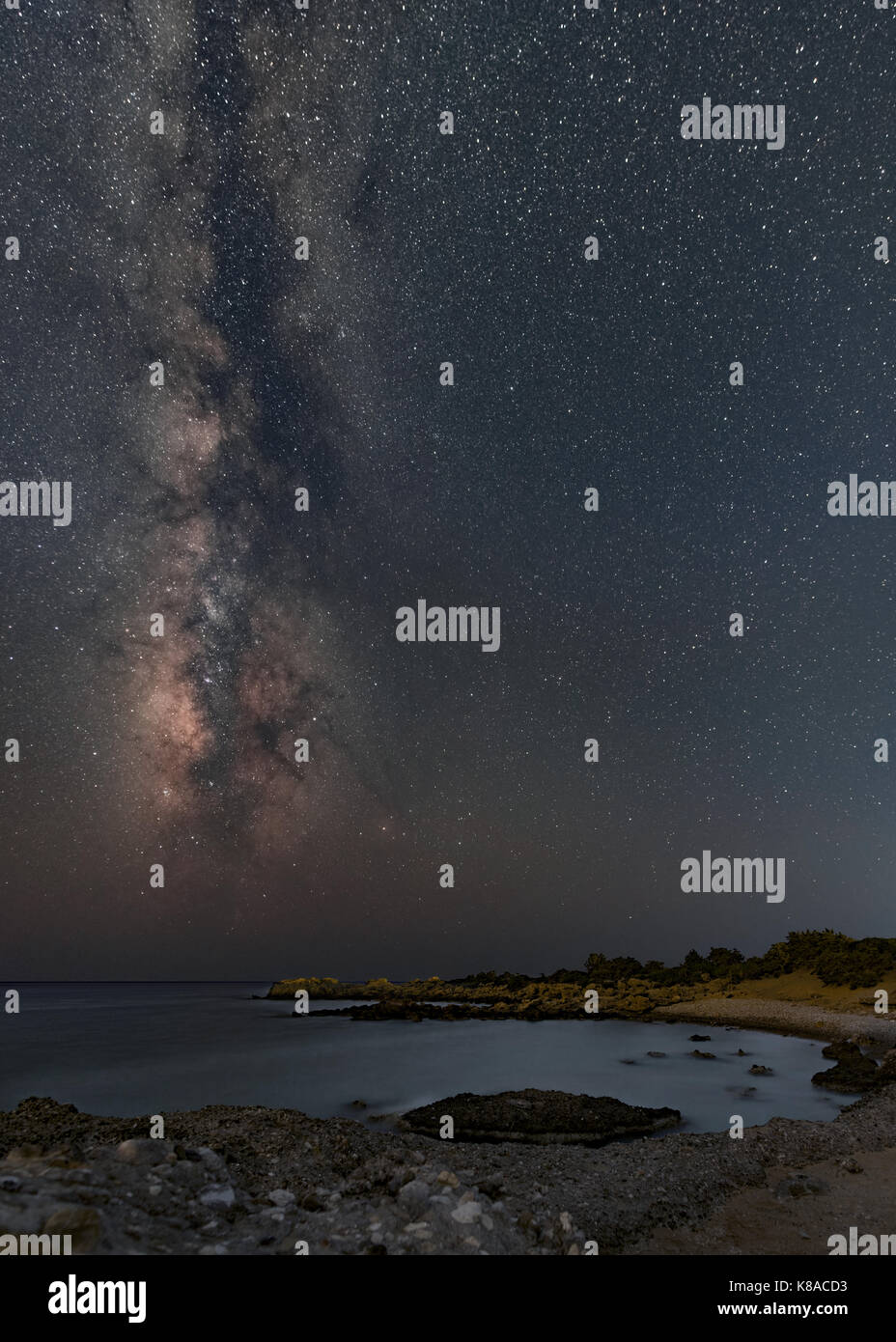 Night sky with Milky Way setting to the Libyan sea Stock Photo - Alamy