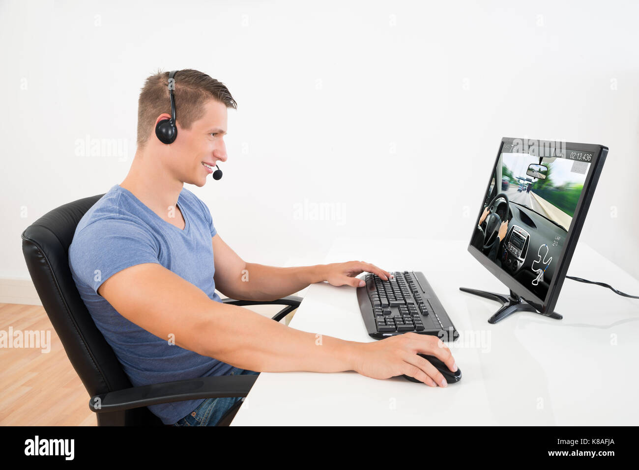 Man gamer playing computer games hi-res stock photography and images ...