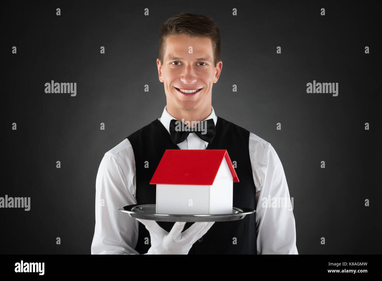 Portrait man holding miniature hi-res stock photography and images - Alamy