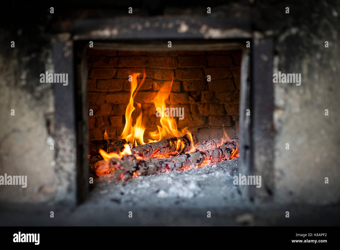 Traditional brick oven burning wood hi-res stock photography and images ...