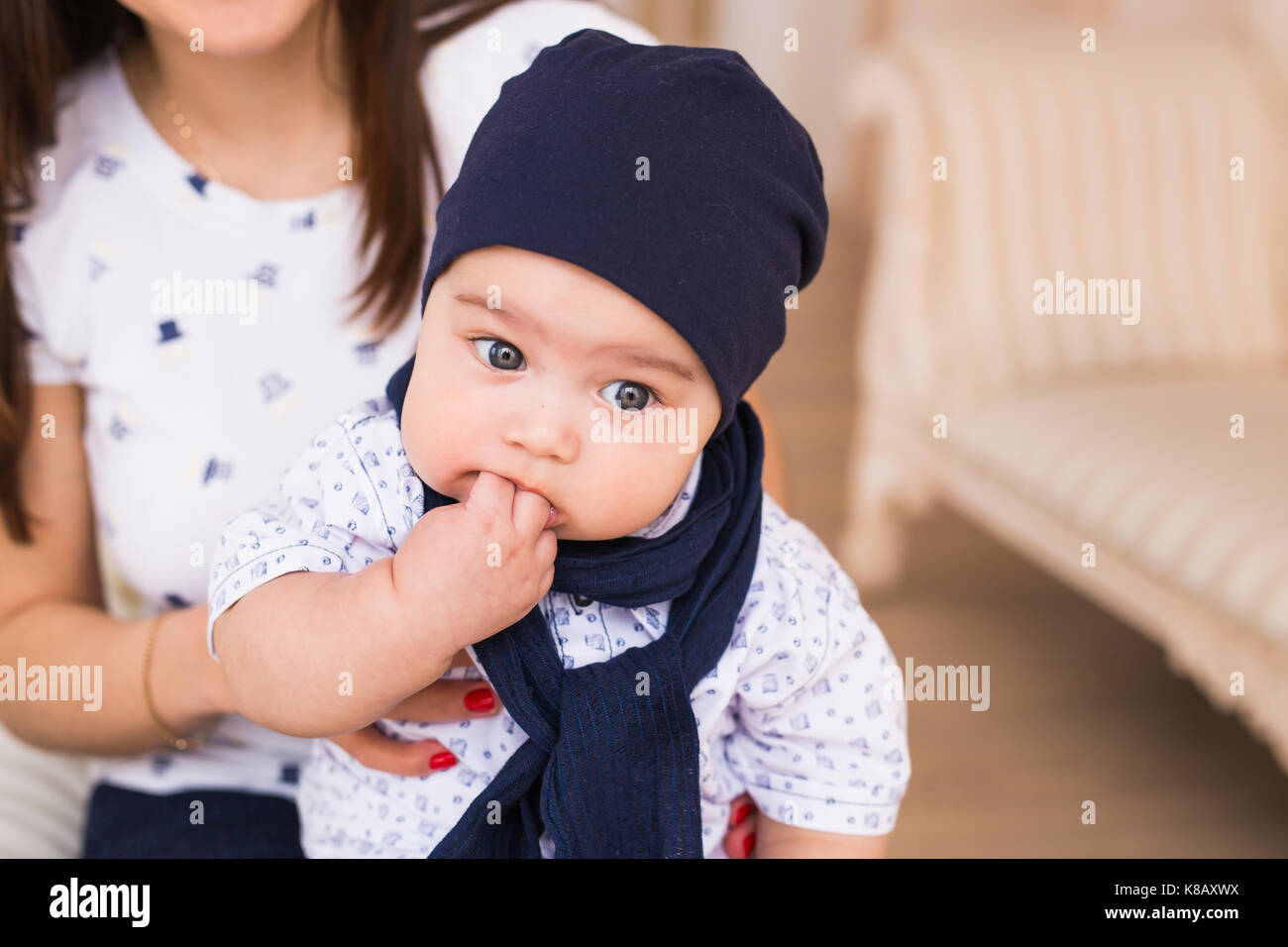 Child, childhood and infant concept - close-up of happy little baby boy ...