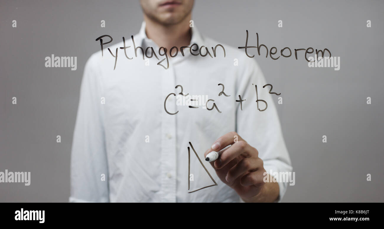 Hand man writing pythagorean theorem hi-res stock photography and ...