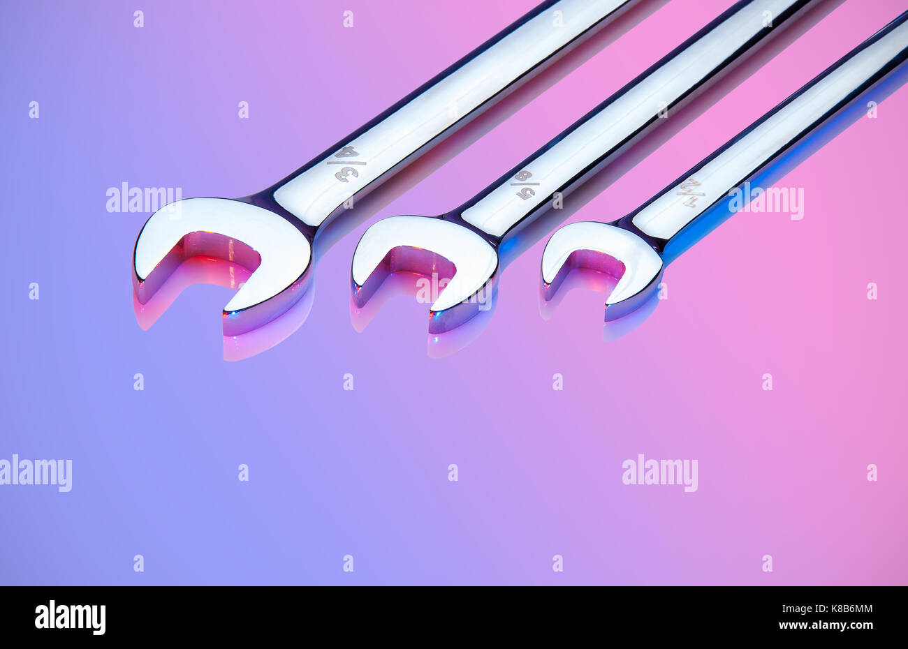 Wrench set Isolated on colorful background Stock Photo - Alamy