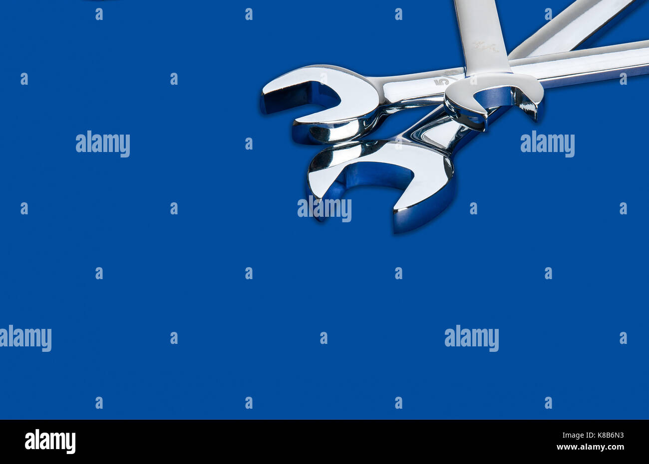 Wrench Set Isolated on blue studio background Stock Photo - Alamy