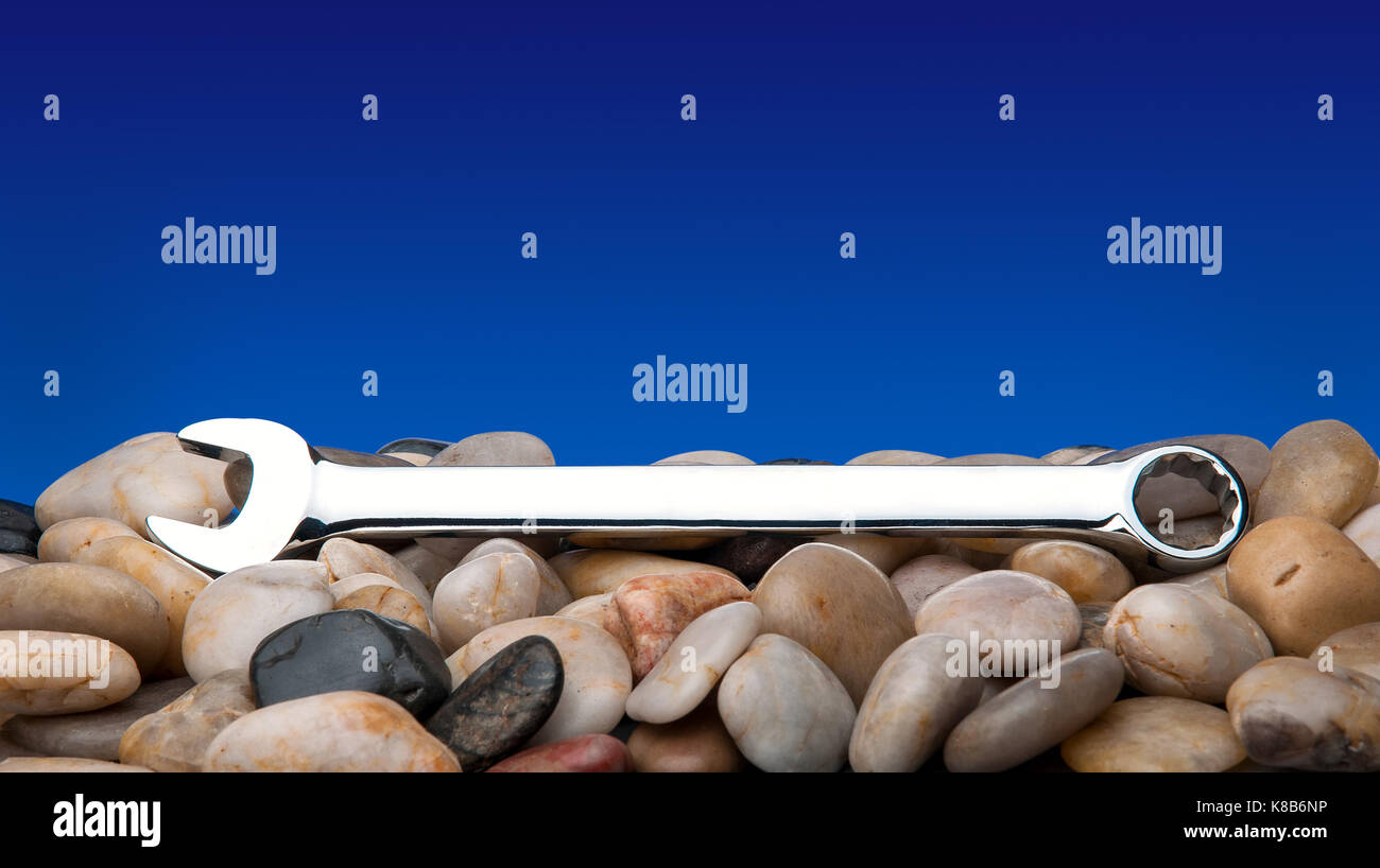 Wrench Set Isolated blue studio background Stock Photo - Alamy