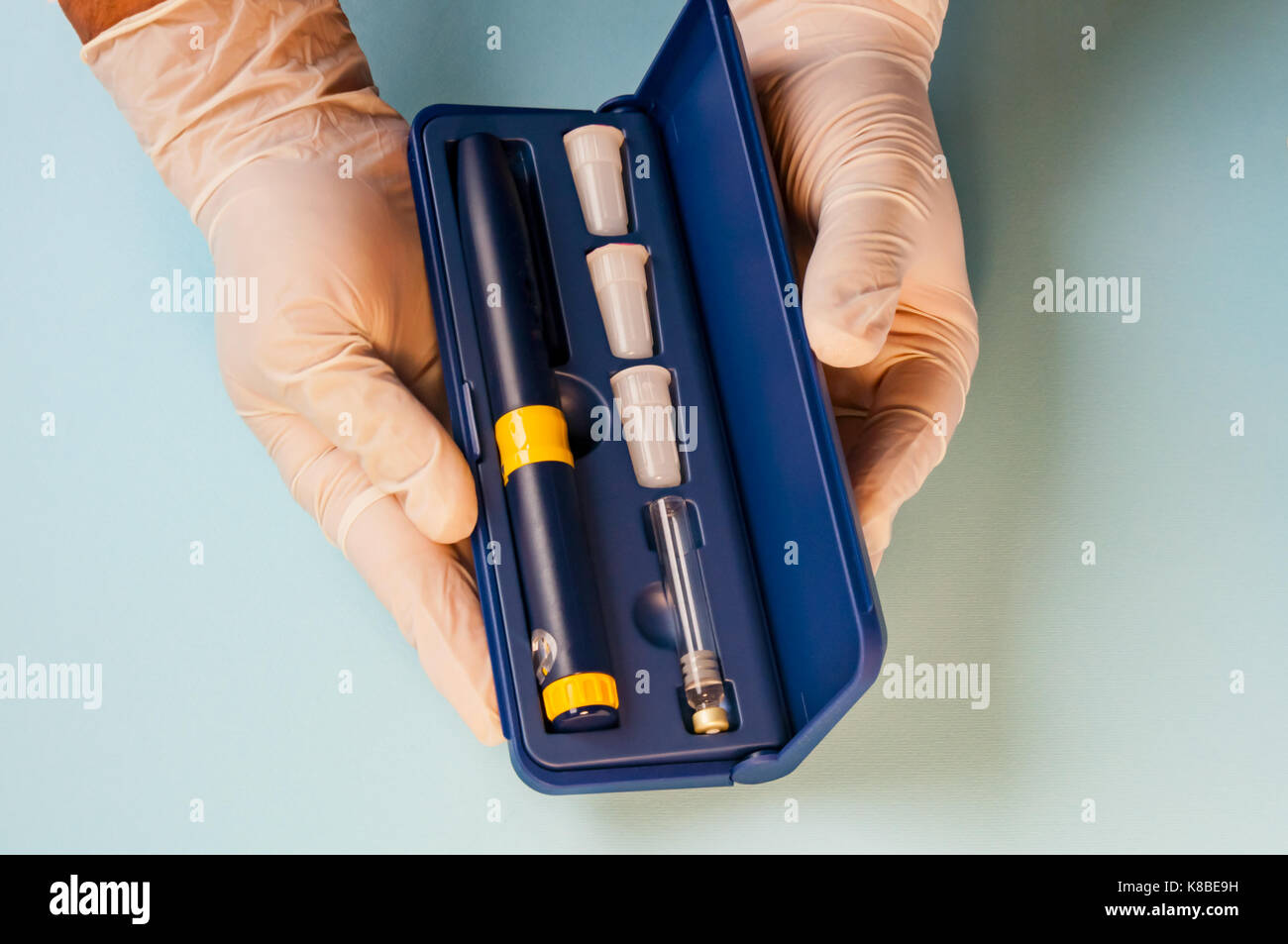 A box with a set of needles, an ampoule with a medical preparation and ...