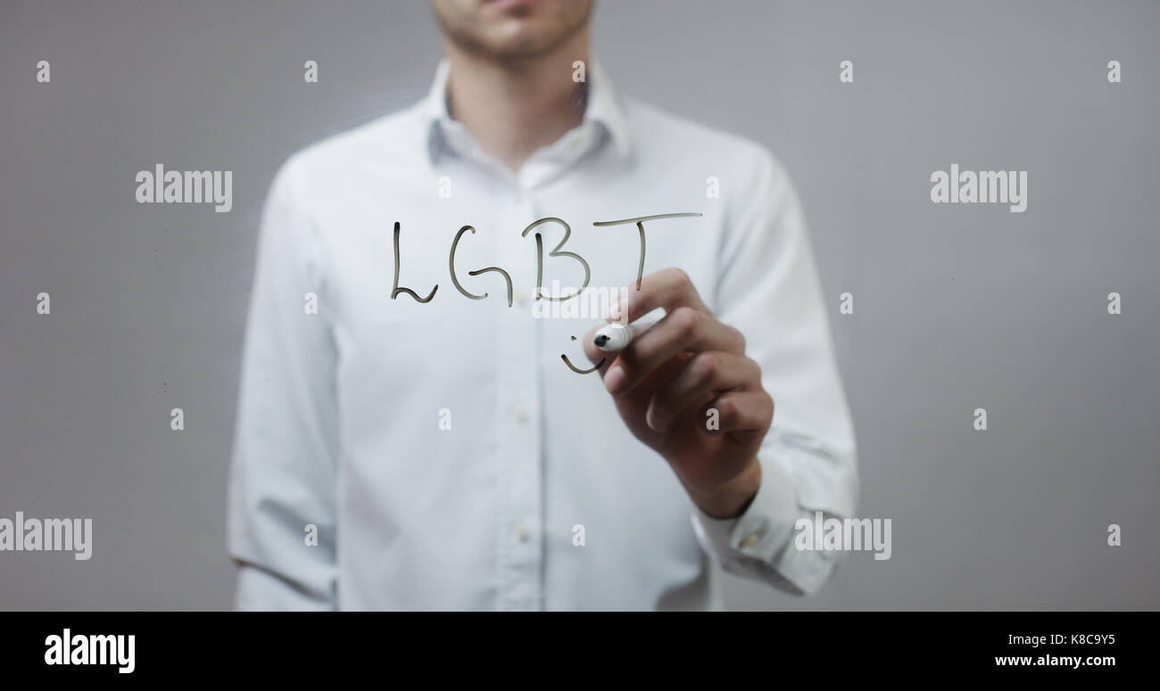 LGBT , Man Writing on Glass Stock Photo - Alamy
