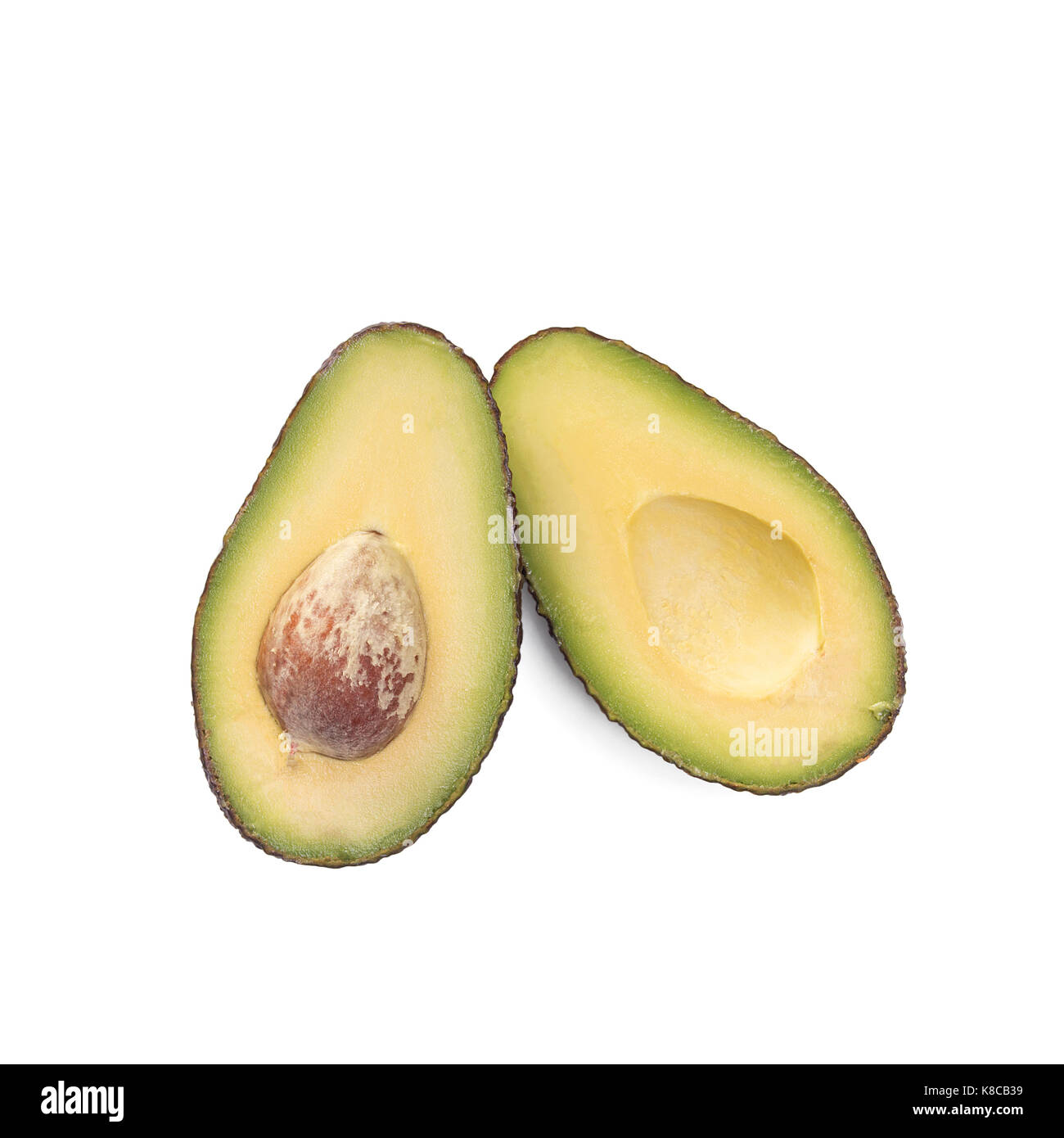 Two slices of avocado isolated on the white background. One slice with ...