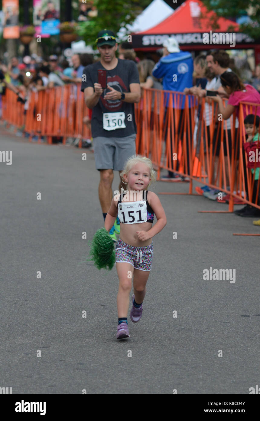 Girl finishing a race hi-res stock photography and images - Alamy