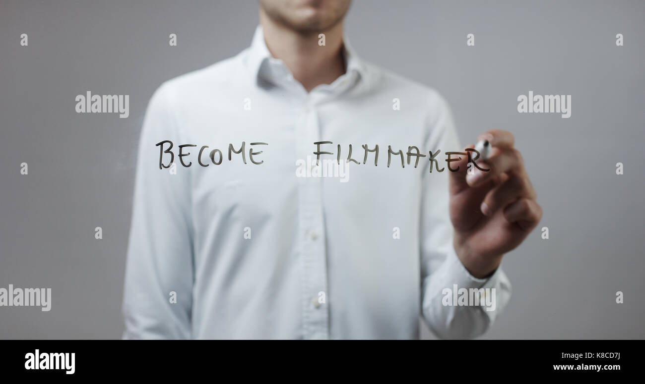 Become filmmaker , Man Writing on Glass Stock Photo - Alamy