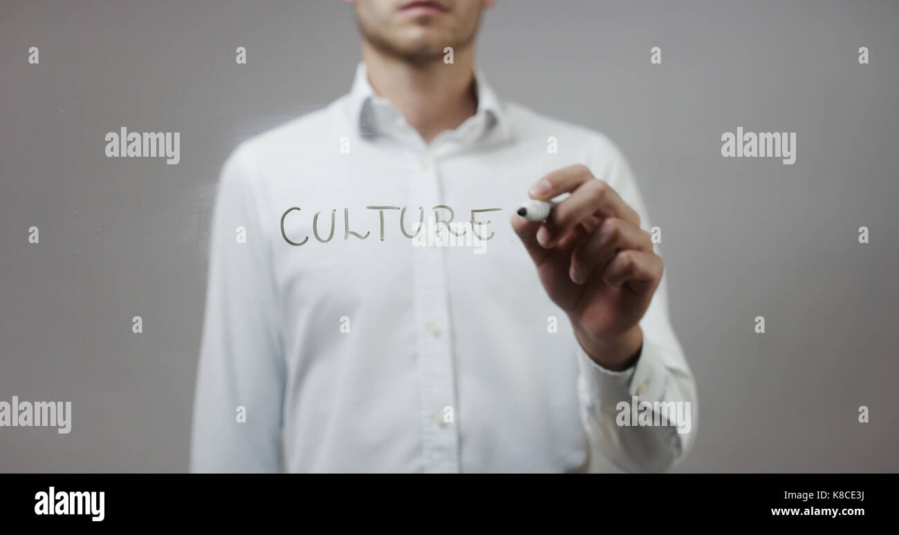 Culture, Man Writing on Glass Stock Photo - Alamy