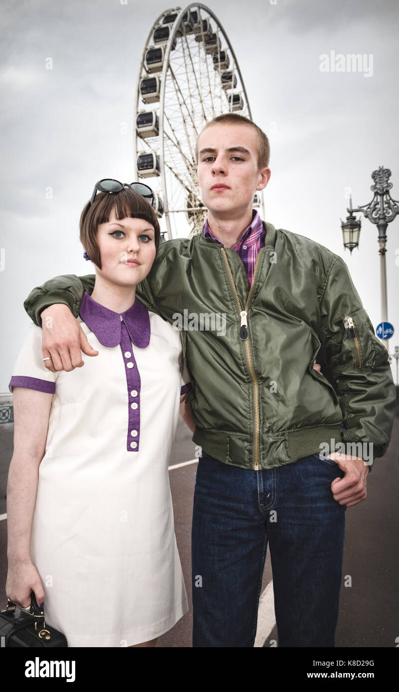 Mod Couple with Brighton Wheel Stock Photo - Alamy