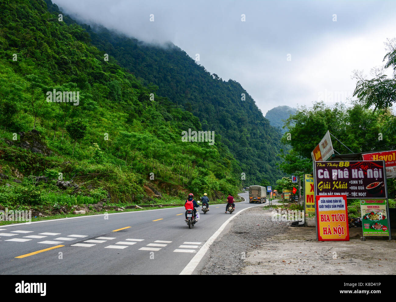 Sapa, Vietnam - May 25, 2016. Motorbikes run on mountain road in Sapa ...