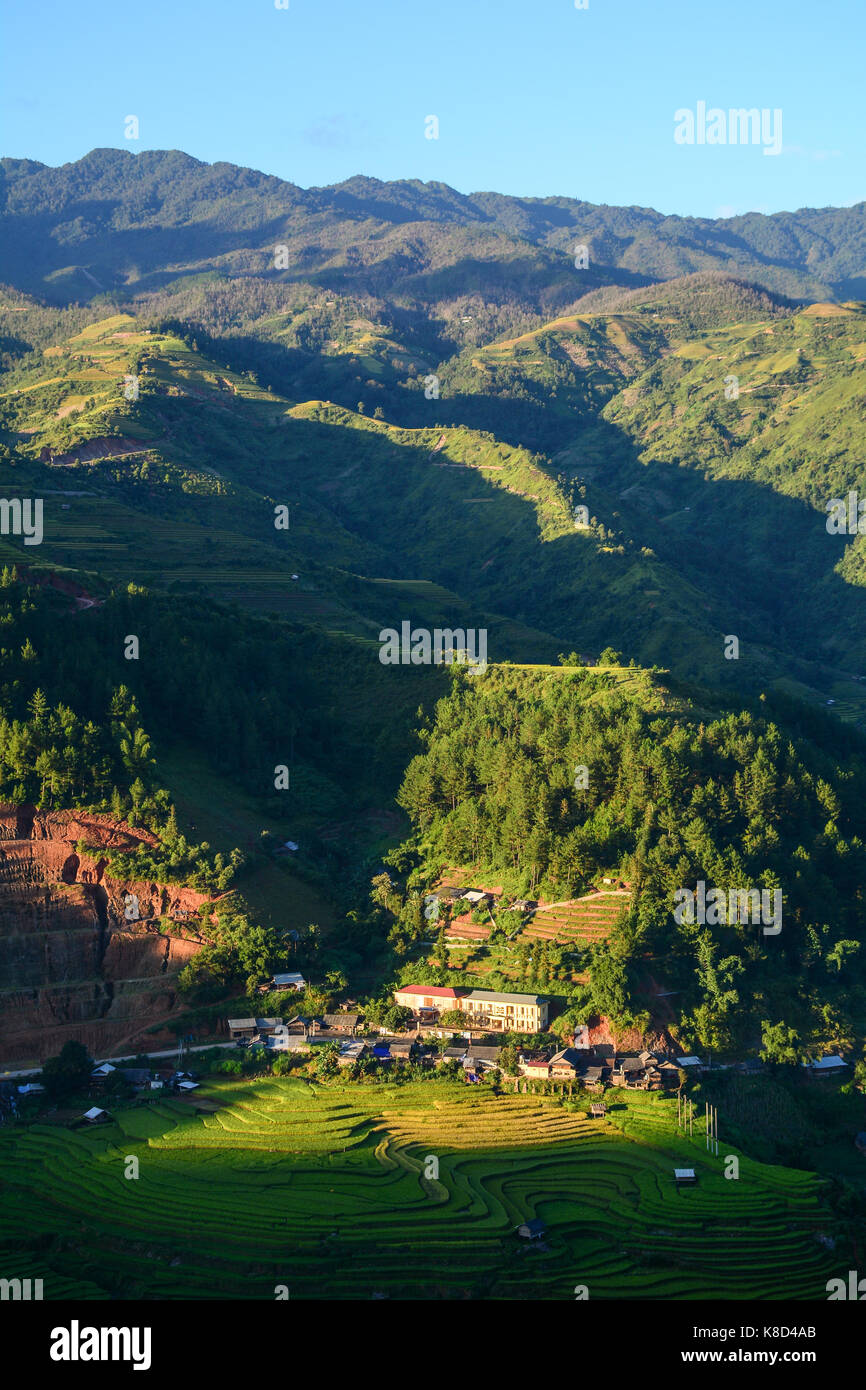 Terraced rice field with small Hmong village in Mu Cang Chai Township ...
