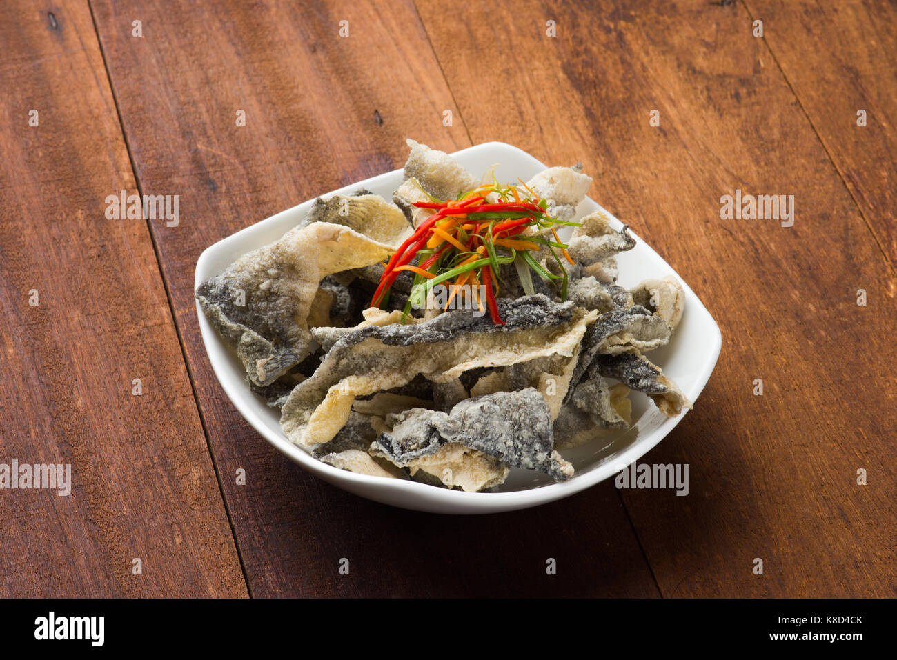 Crispy fried fish Skin w Stock Photo - Alamy